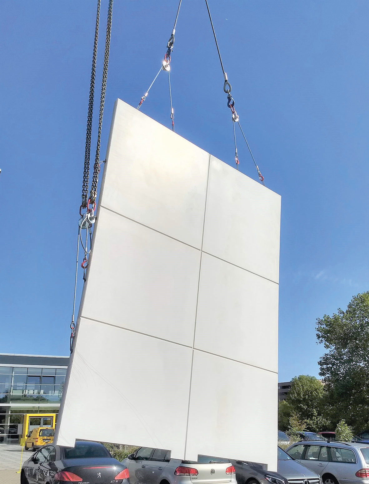 Two-story, thin-walled architectural façades built in white concrete ...