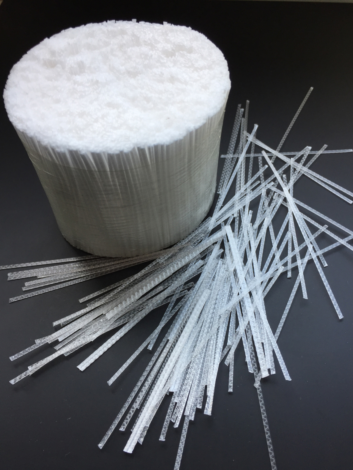 New macro polymer fibers for load-bearing applications in concrete and ...