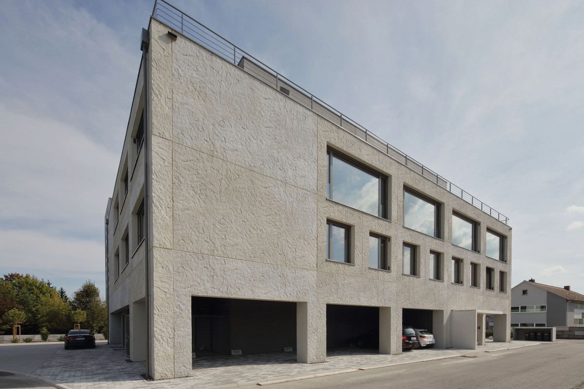Rock façade made of precast elements for the administration building of ...