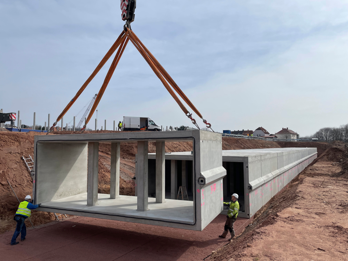 Rainwater retention basin for John Deere logistics center - Concrete ...