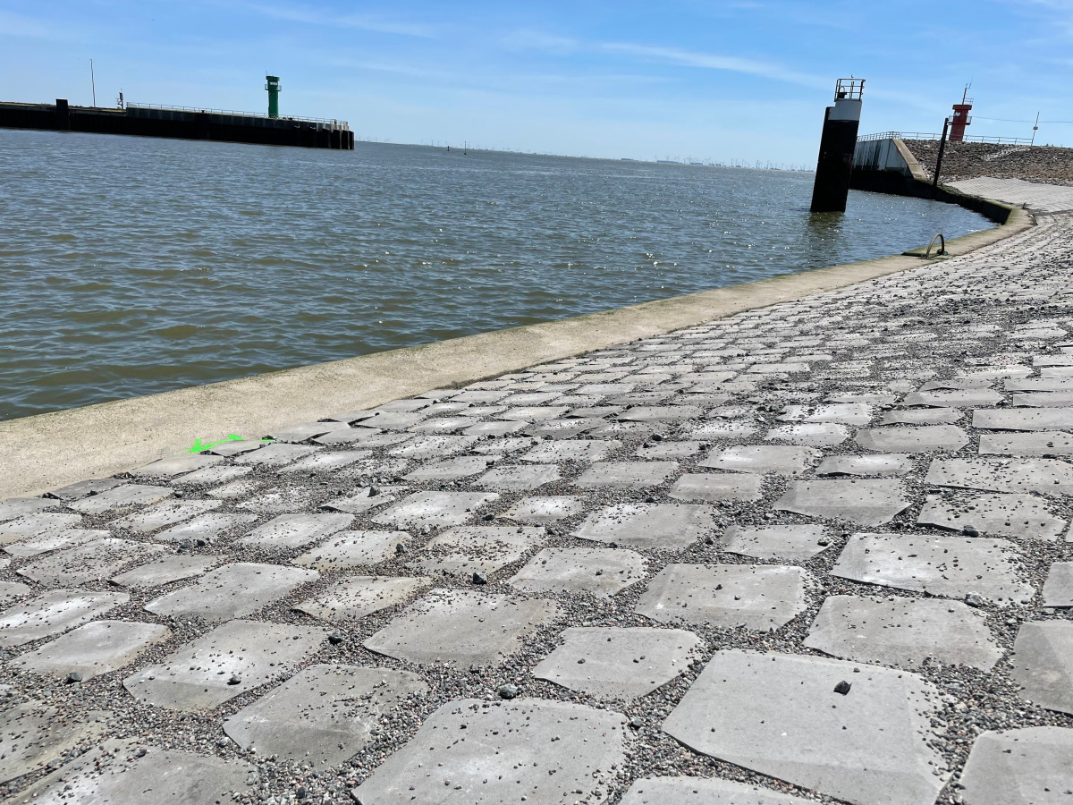 Sustainable coastline protection with non- interlocking concrete slab ...